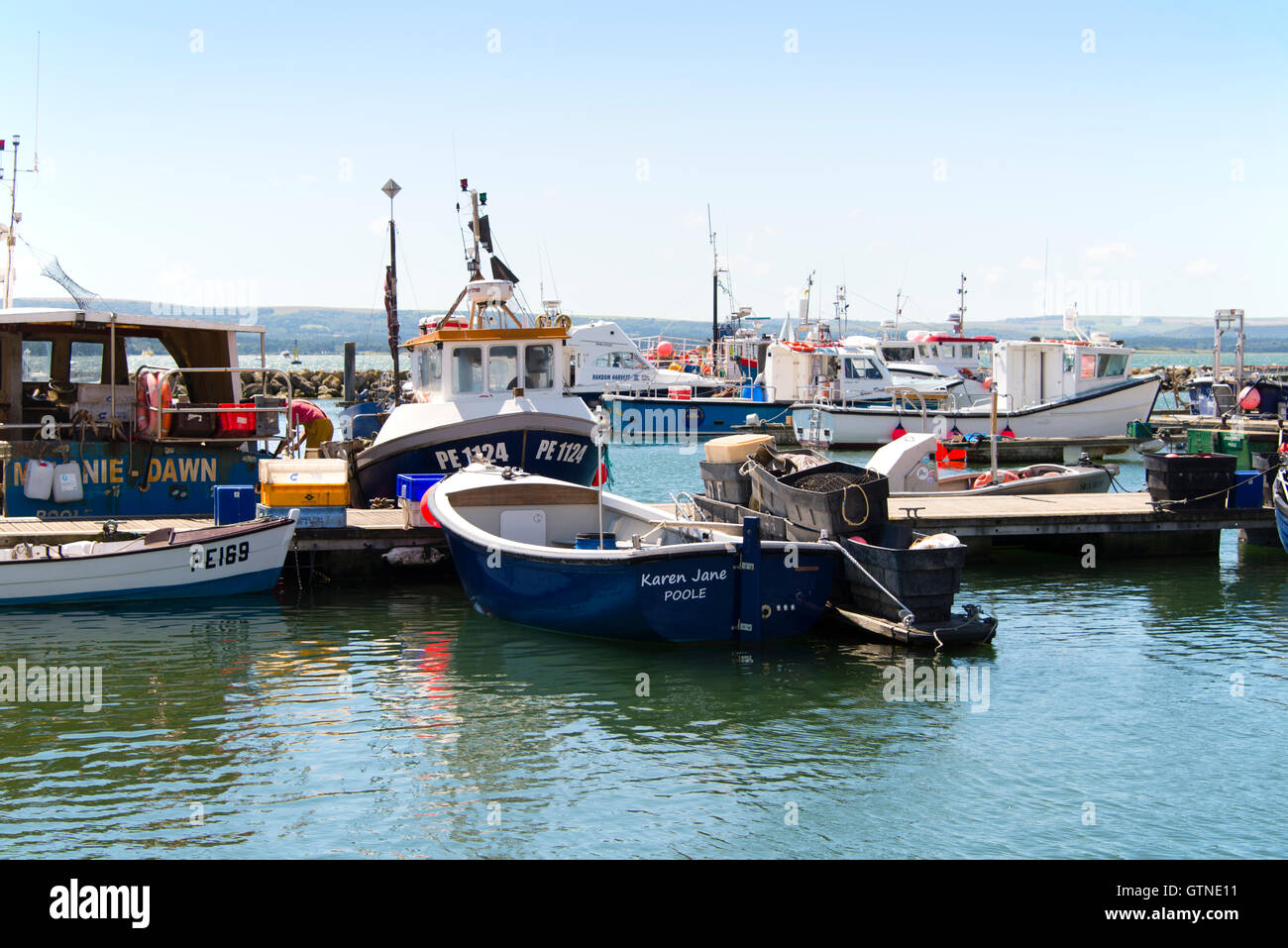 Fishing boats in Poole Quay, Poole, Dorset, England, UK Stock Photo - Alamy