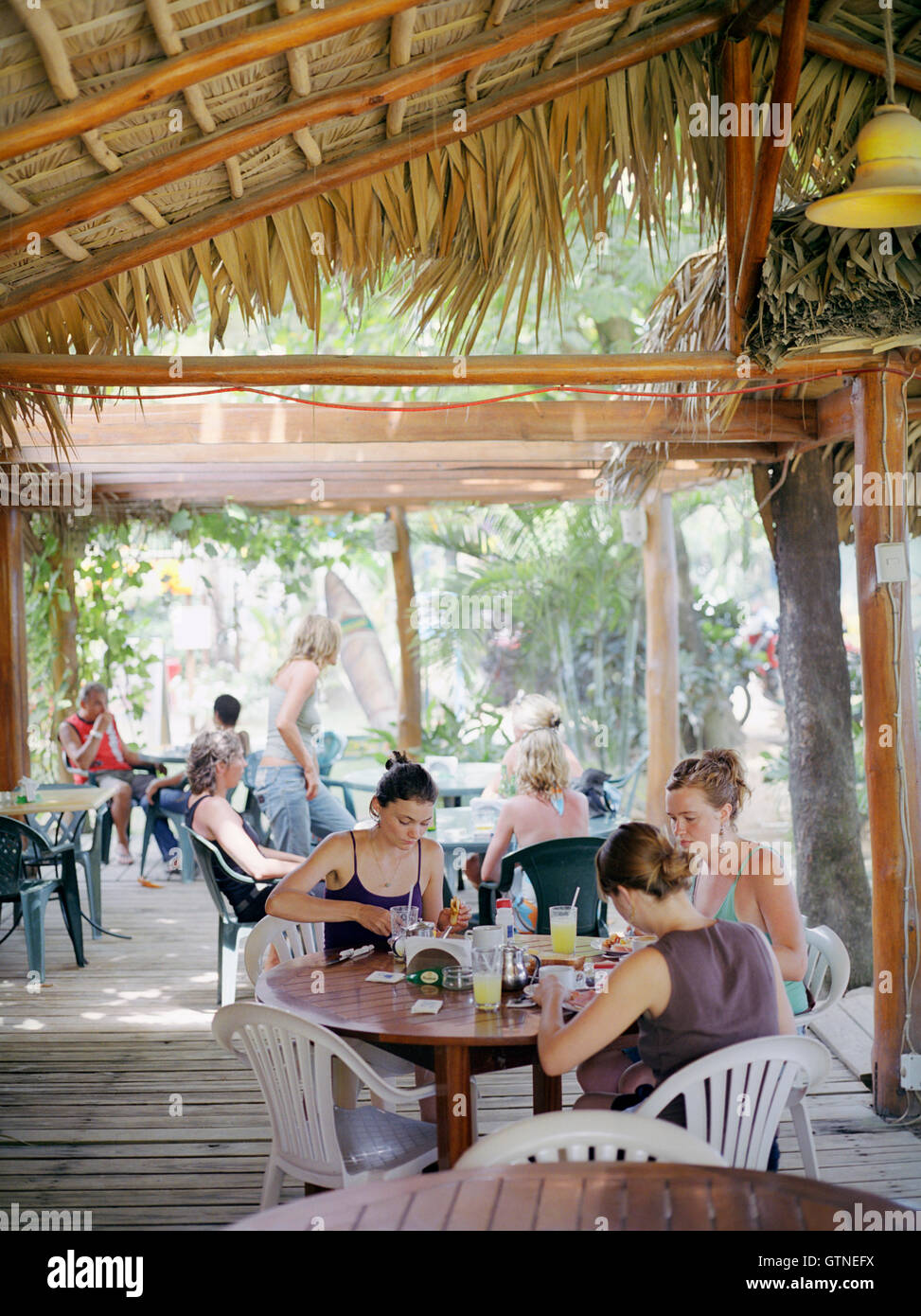 A group of Western tourists eat breakfast at Bruno Restaurant in the ...
