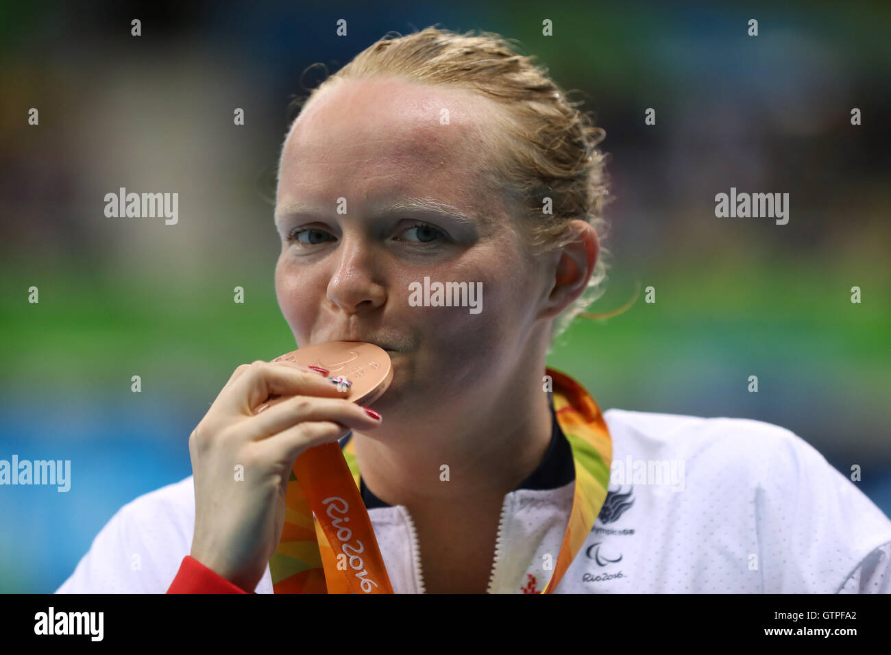 Great Britain's Susannah Rodgers bites her Bronze medal during the ...