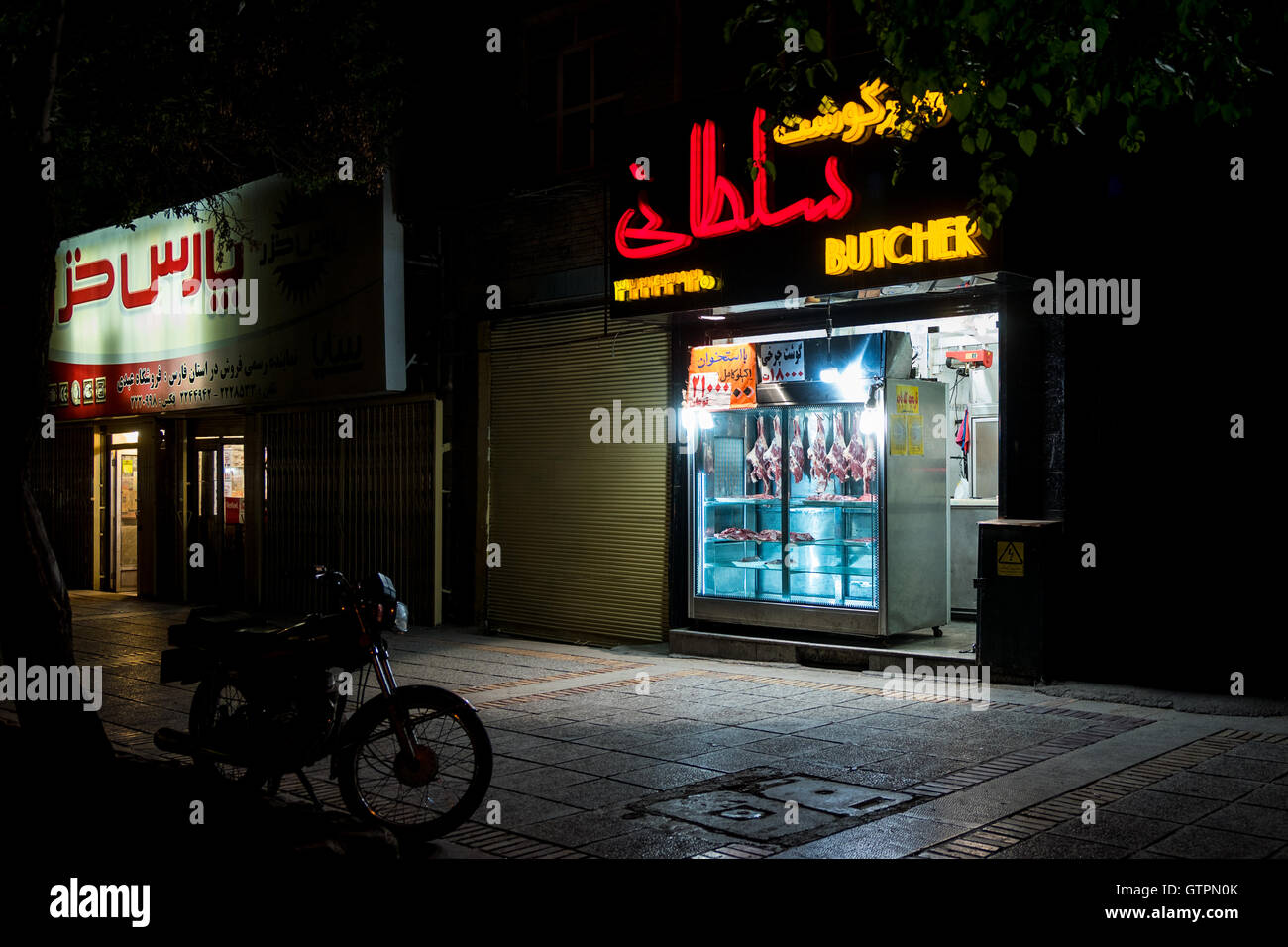 Butcher shop at night in Shiraz, Iran Stock Photo - Alamy