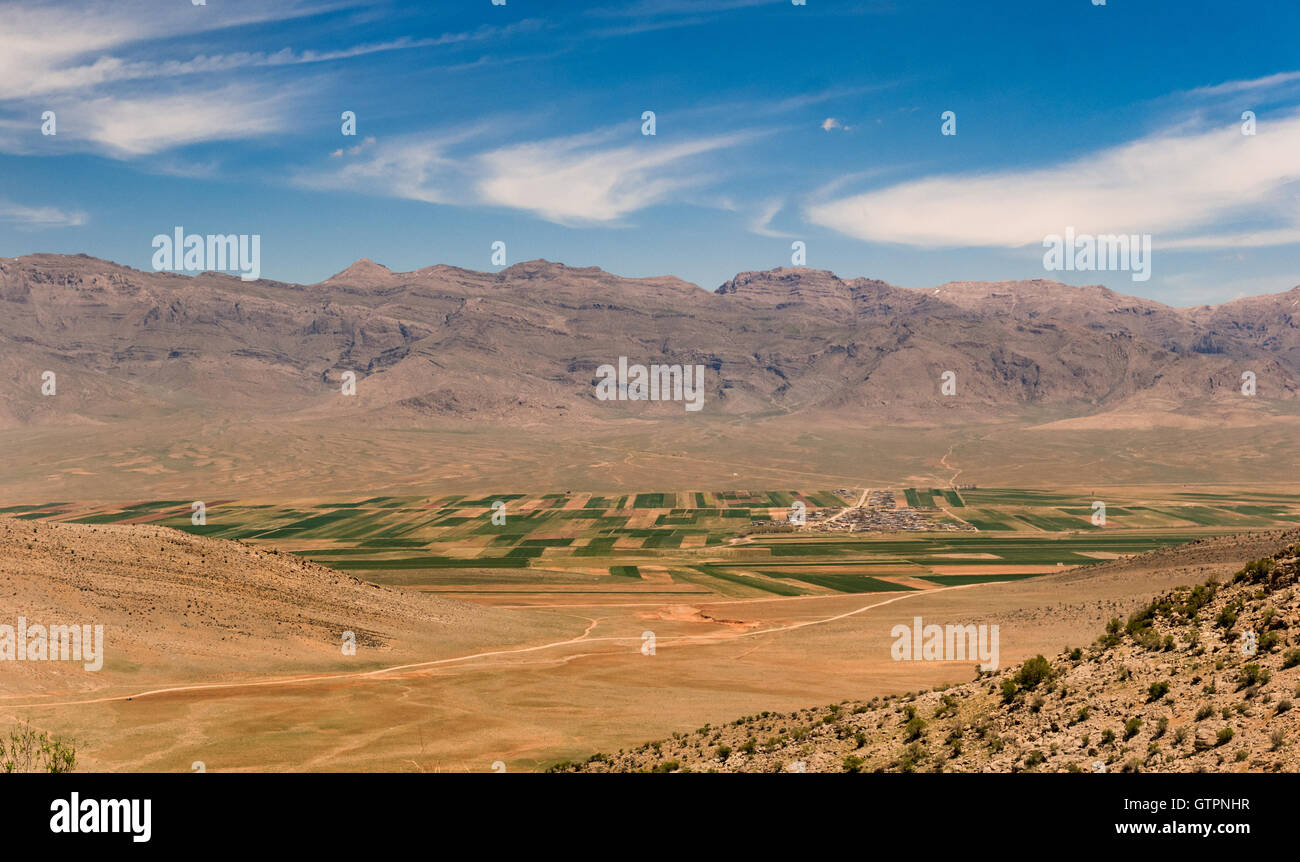 Agriculture in Fars Province valley Iran. Rural roads with wheat fields ...