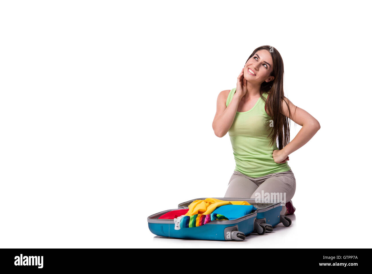 Woman packing preparing for summer vacation isolated on white Stock ...