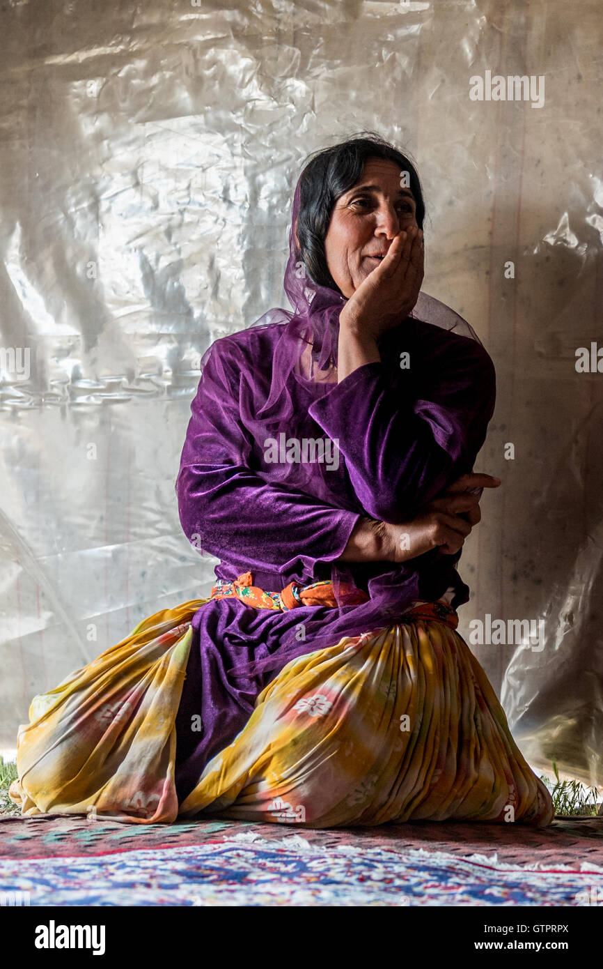 Khoram Gol, nomadic Basseri woman in her family's tent. The Basseri are ...
