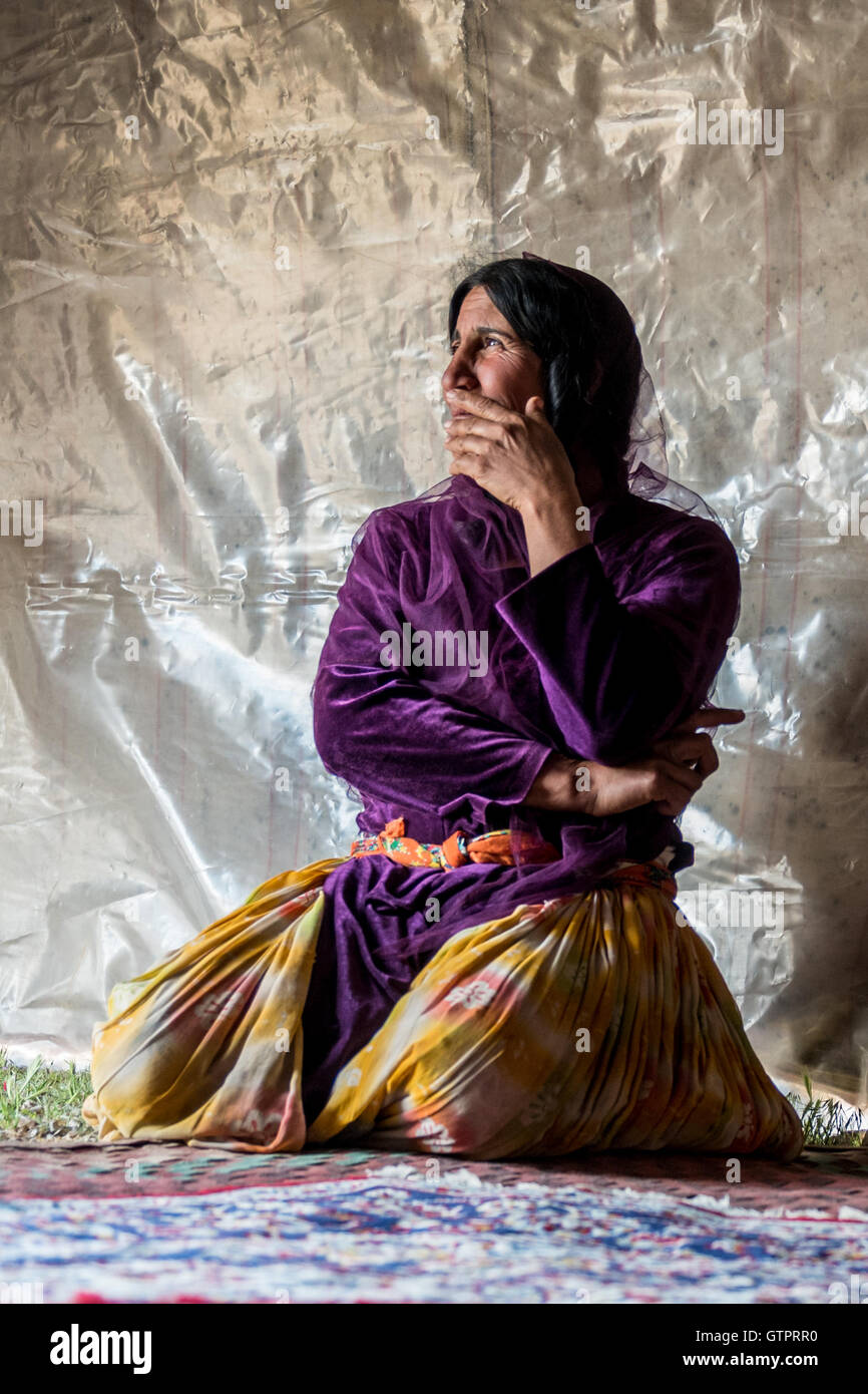 Khoram Gol, nomadic Basseri woman in her family's tent. The Basseri are ...