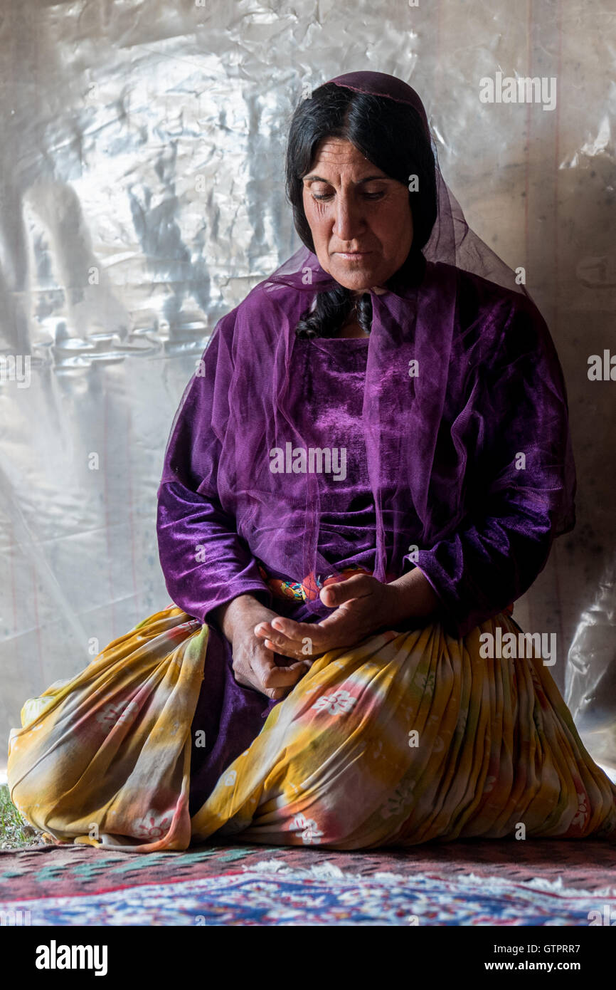 Khoram Gol, nomadic Basseri woman in her family's tent. The Basseri are ...