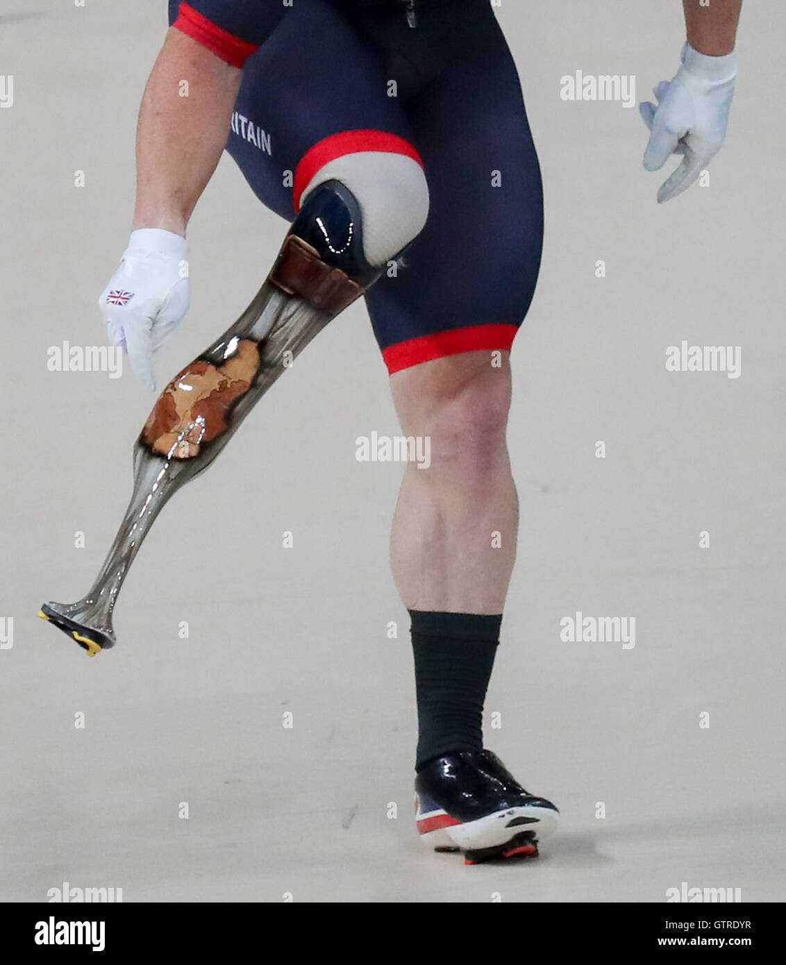 Cyclist Jody Cundy of Great Britain points on his prothesis after ...