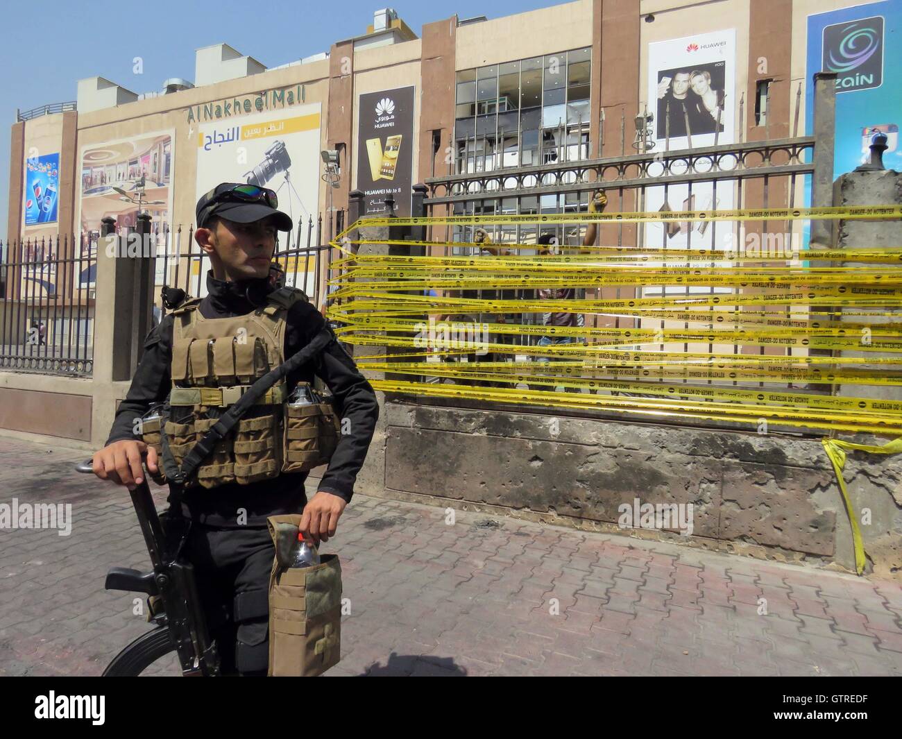 Baghdad, Iraq. 10th Sep, 2016. A security member stands at the site of ...