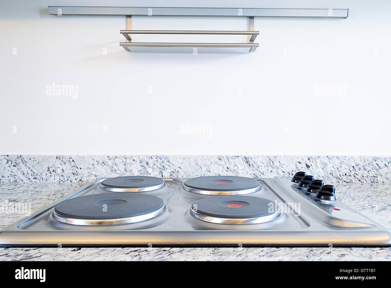 Four electric elements on a stove Stock Photo - Alamy