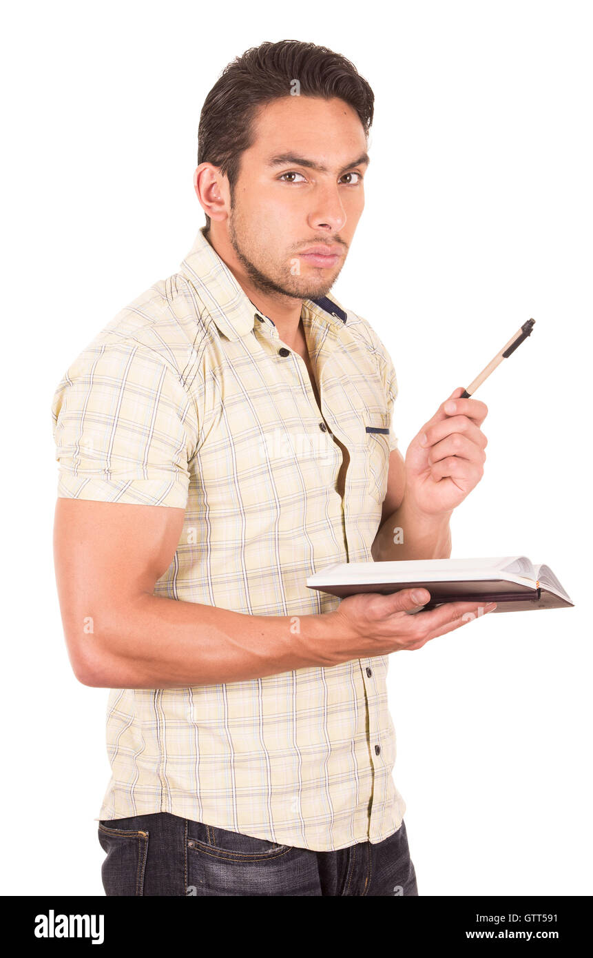 young handsome male teacher holding notebook Stock Photo - Alamy