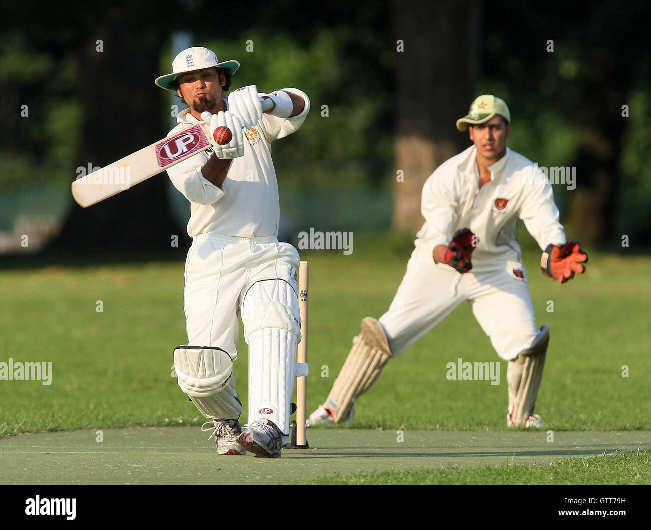 H Afridi in batting action for VPJ as Raja looks on from behind the ...