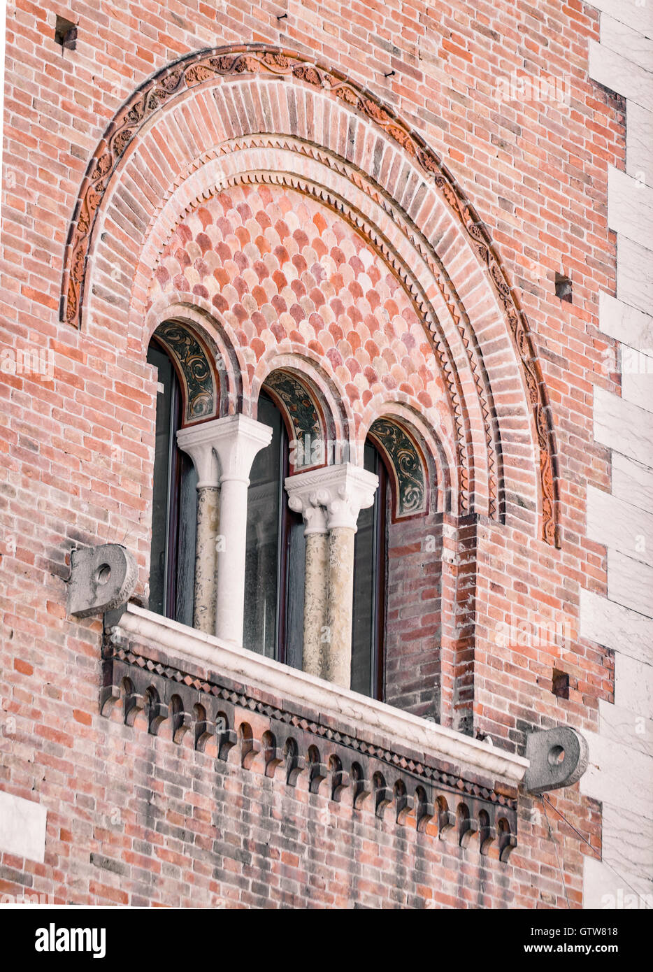 Triple lancet window of Italian medieval palace Stock Photo - Alamy