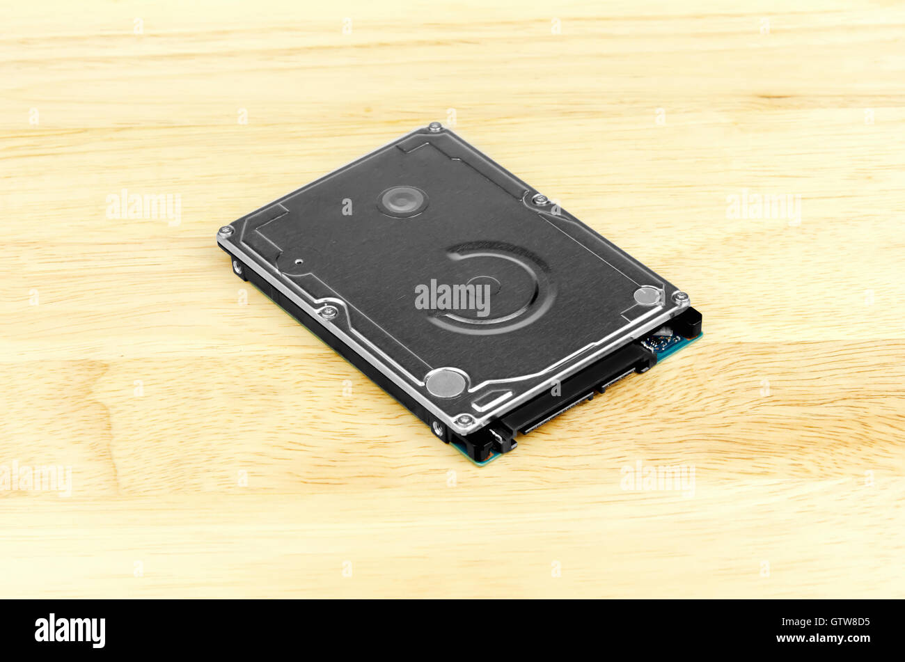 harddisk on wood desk background wood texture Stock Photo - Alamy