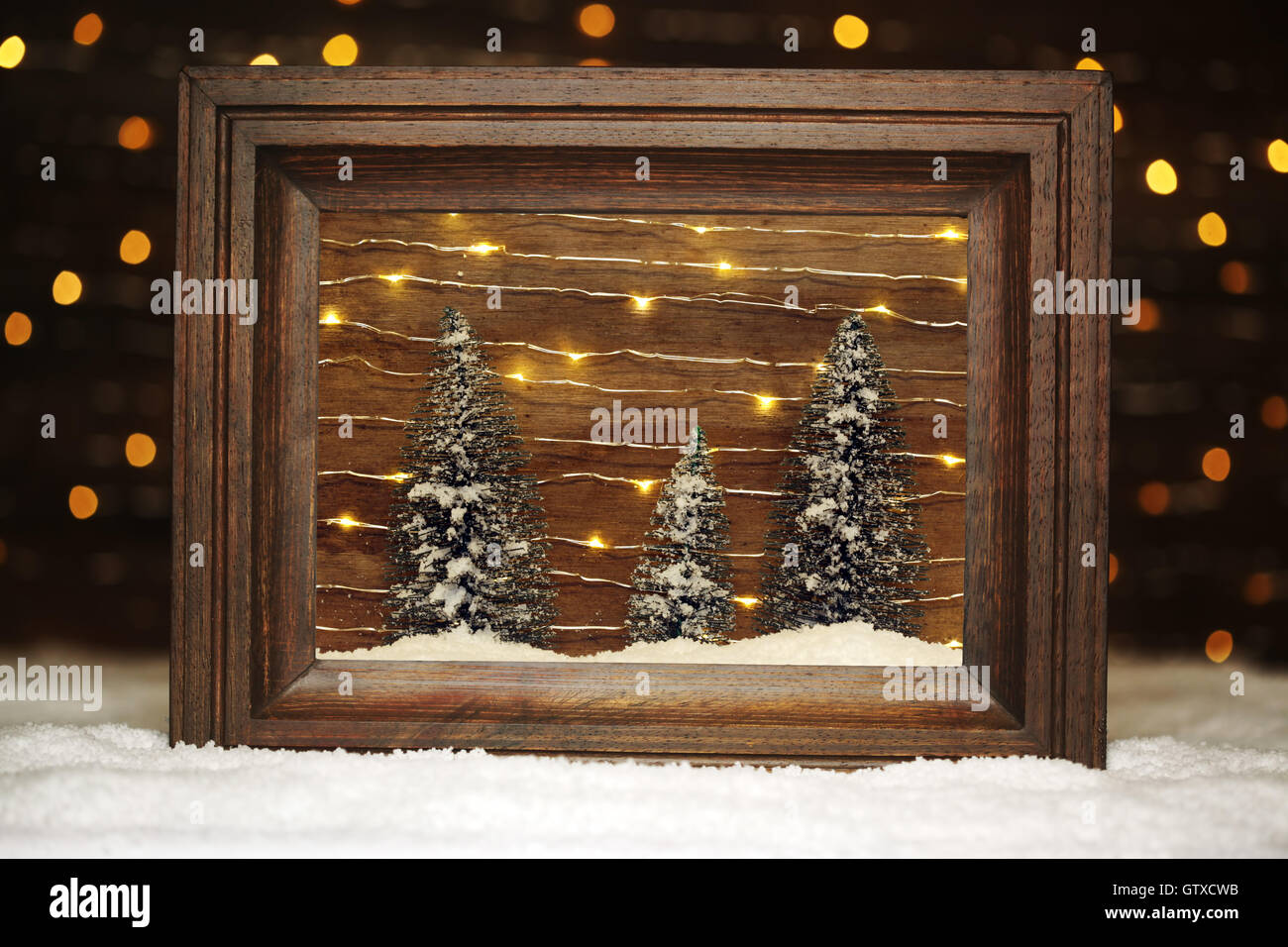 Peaceful winter scene in frame with trees and snow Stock Photo - Alamy