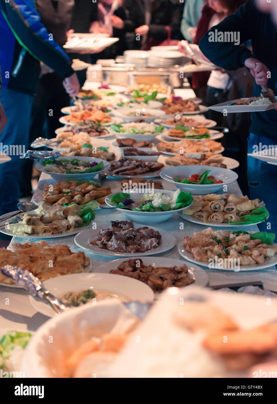 people group catering buffet food indoor in school restaurant with meat ...