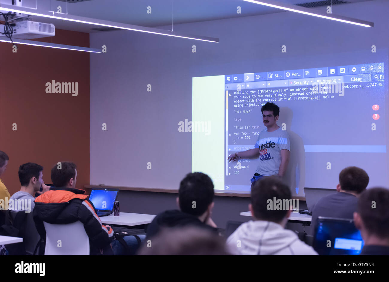 young computer technology students on code programming class have ...