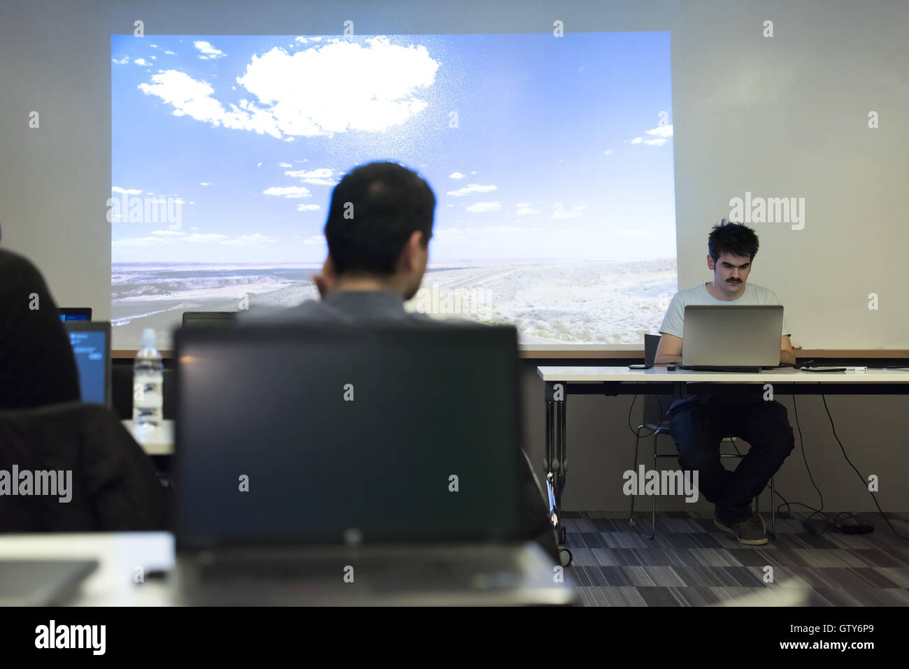 young computer technology students on code programming class have ...