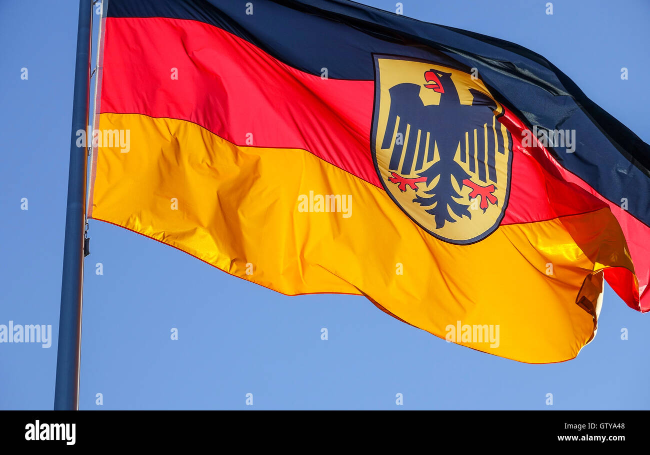 German Flag waving in the wind Stock Photo - Alamy