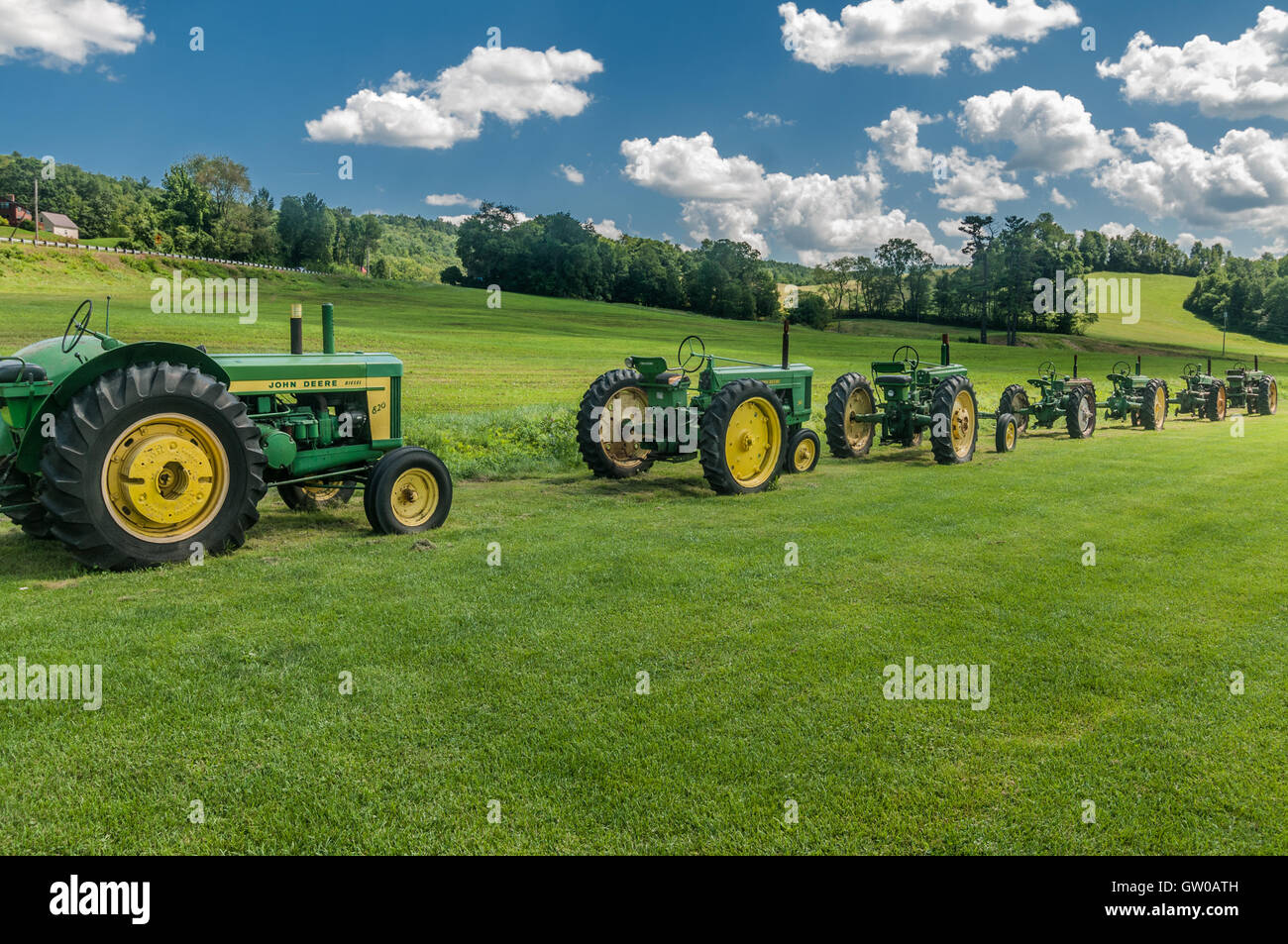 A line of antique tractors on display at a farm in southern New ...