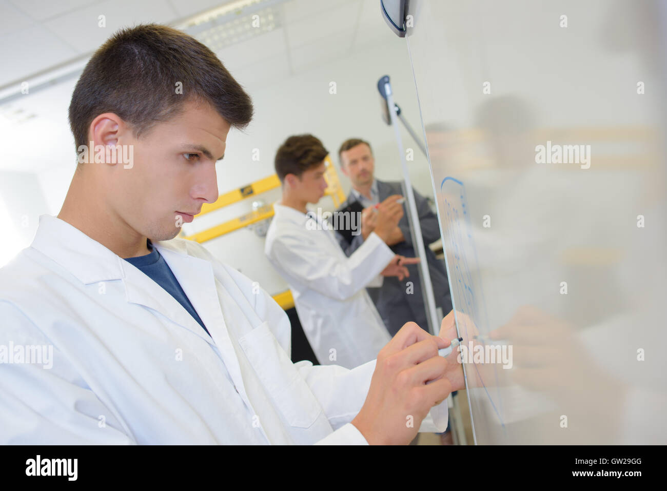 drawing on the white board Stock Photo - Alamy