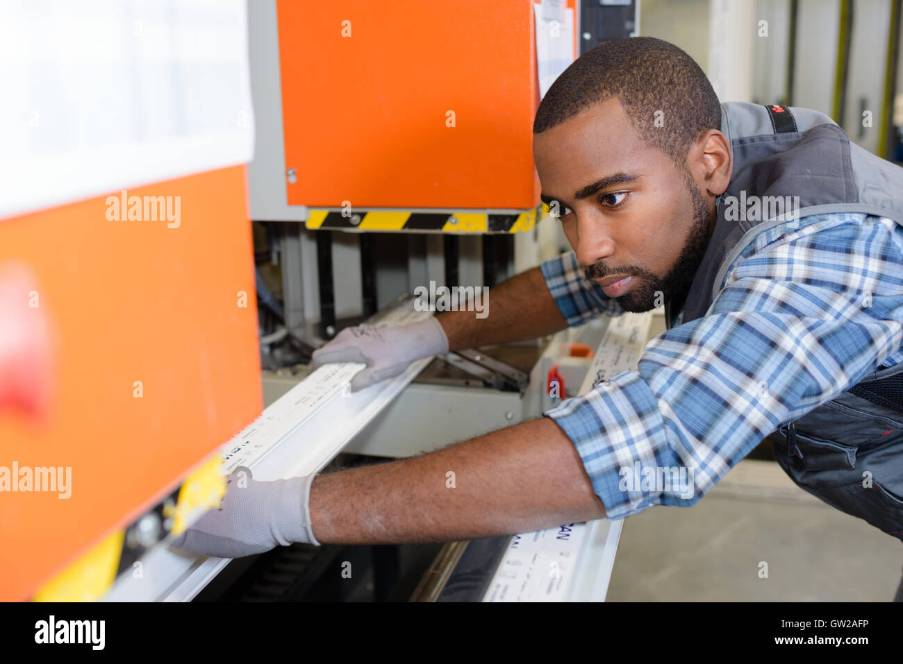 Serious skilled worker employee hi-res stock photography and images - Alamy