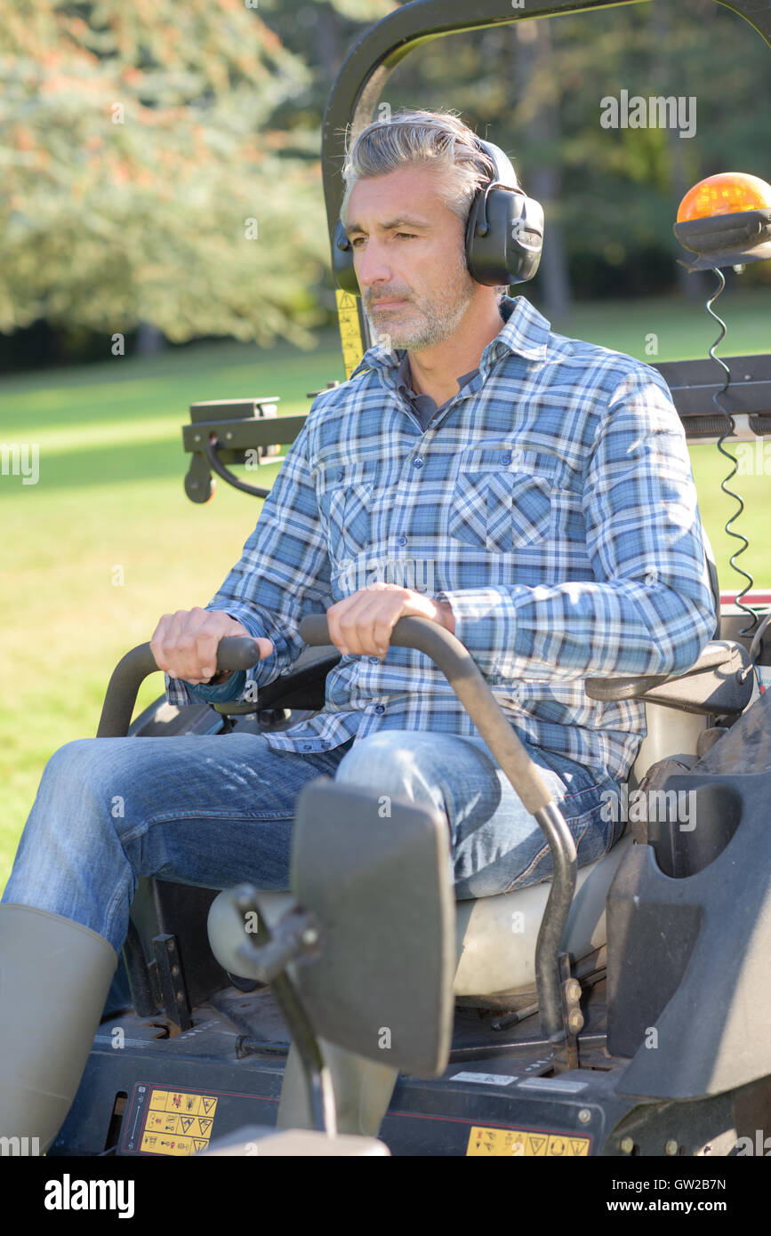landscaping worker on the grounds Stock Photo - Alamy