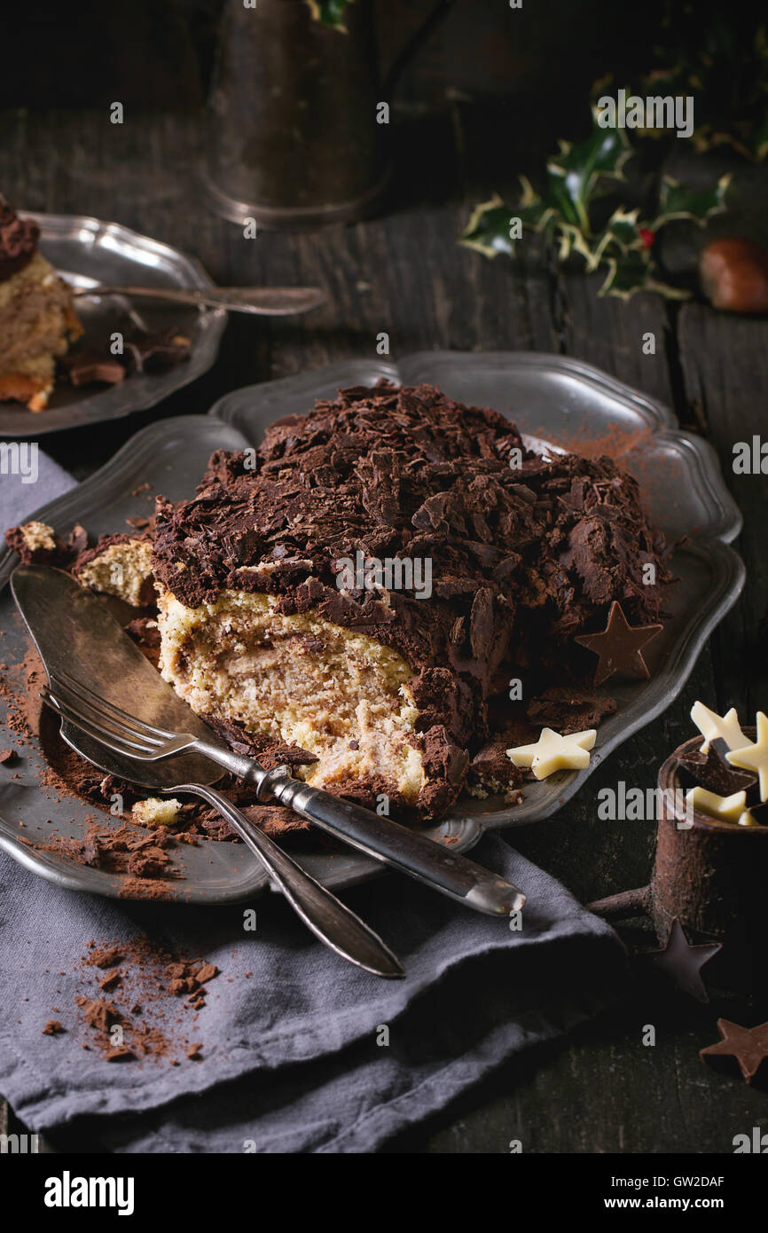 Sliced christmas chocolate yule log Stock Photo - Alamy