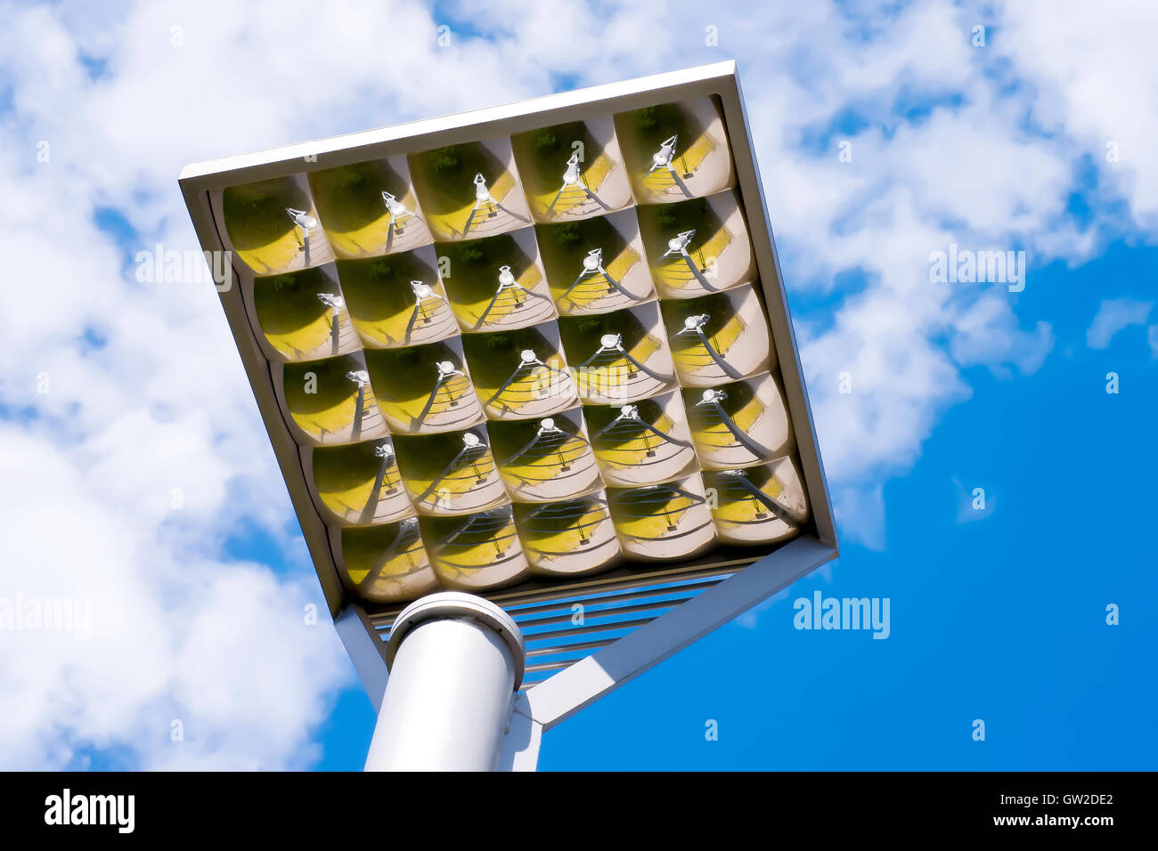 Outdoor faceted illumination reflector with ground reflection against ...