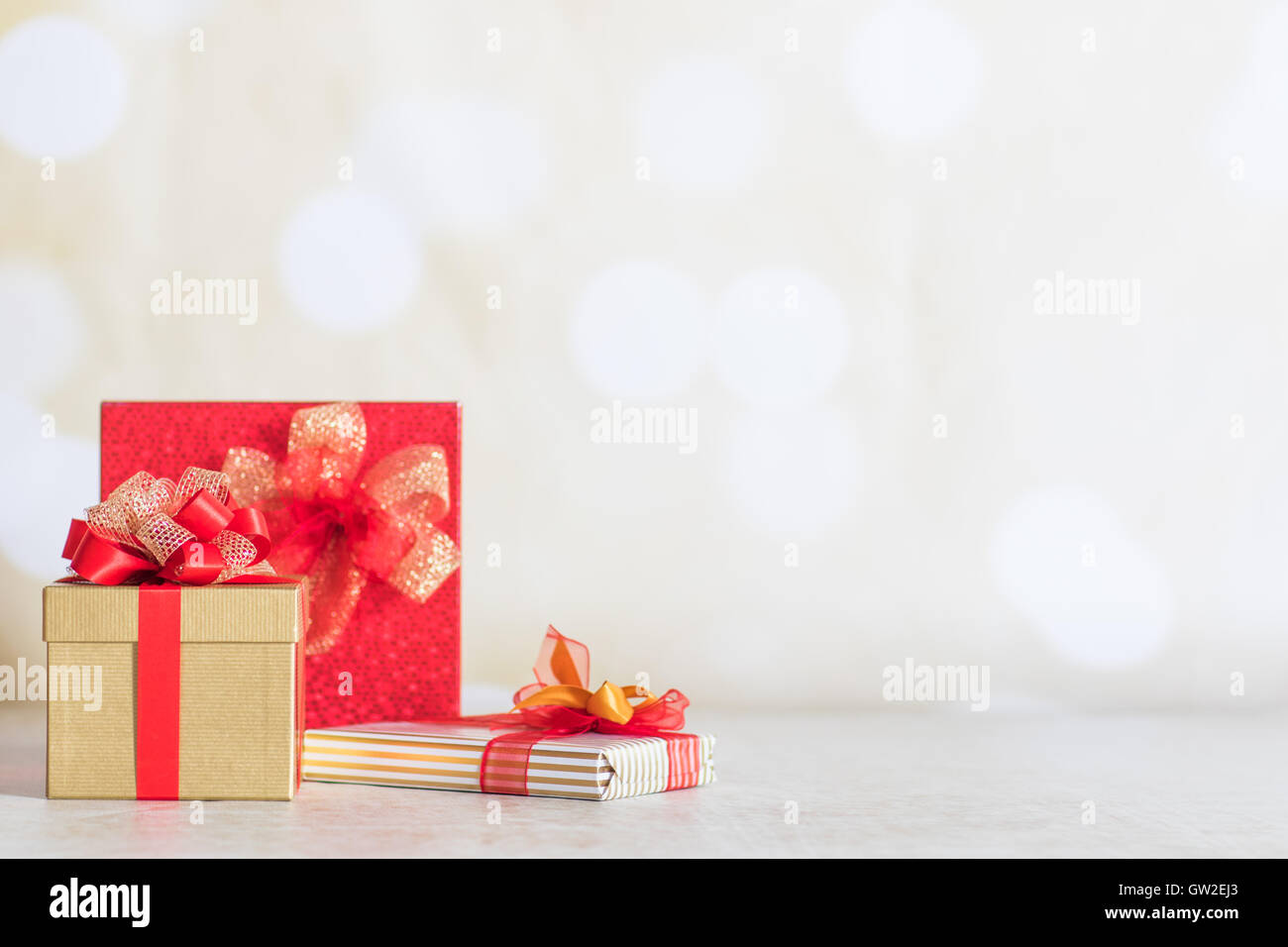 Presents on a background with lights Stock Photo - Alamy