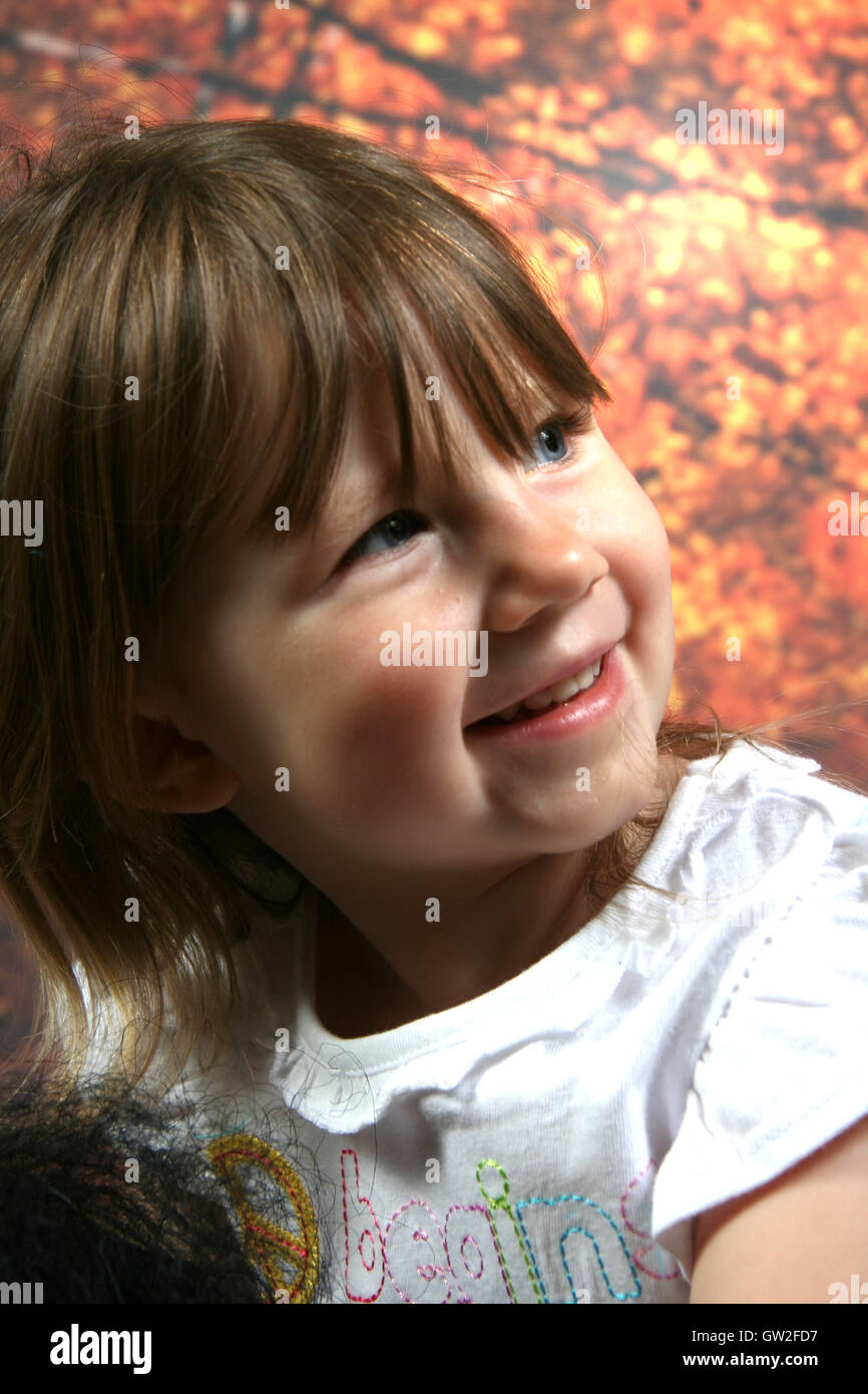 Little Girl in Autumn Stock Photo - Alamy