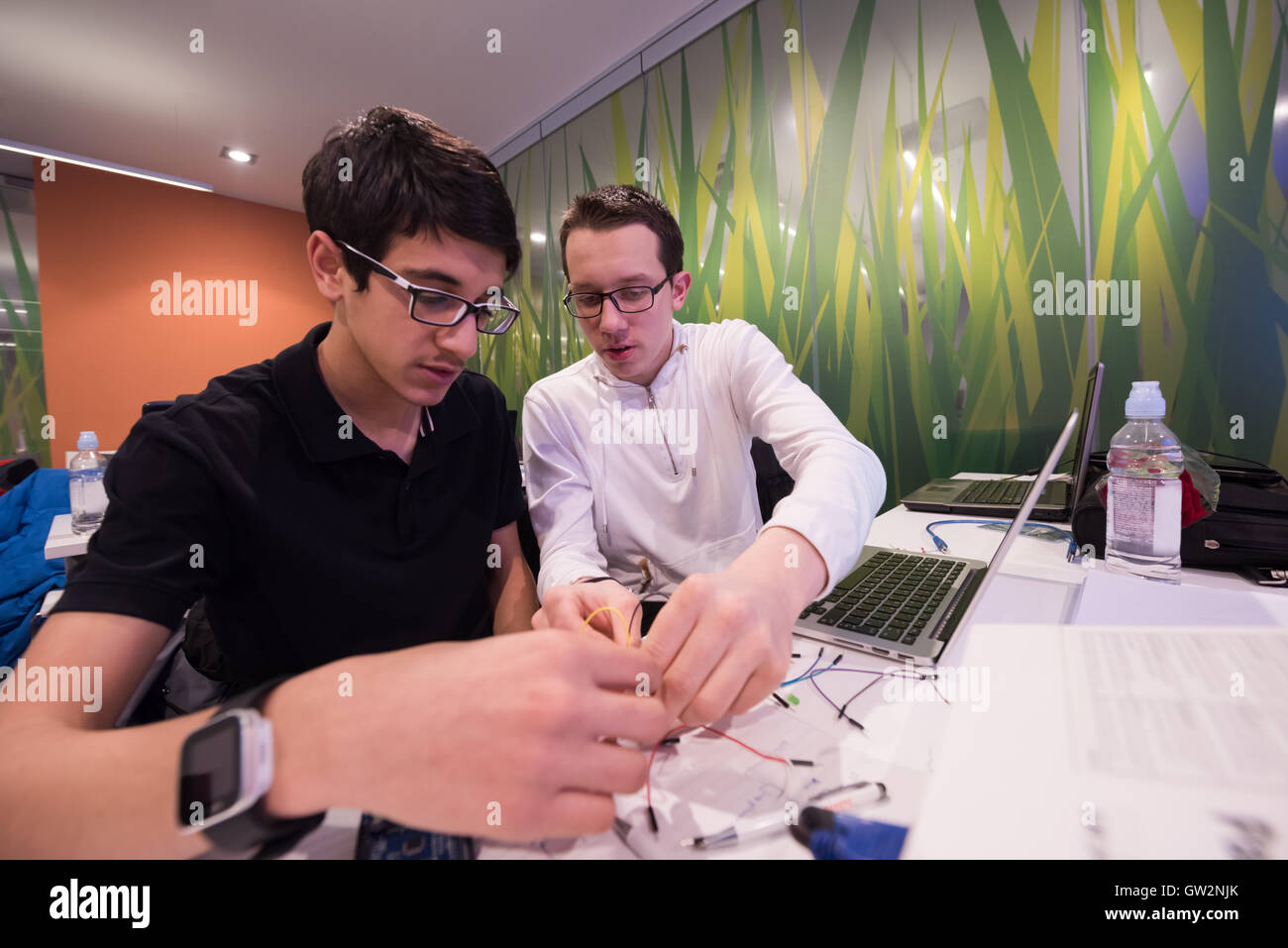 it students in computer science classroom working together on project ...