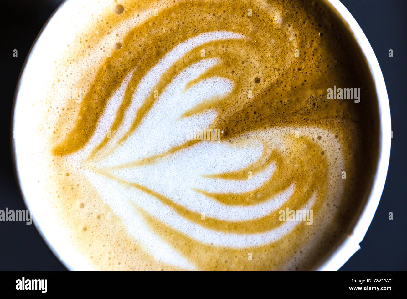 Floral decorated froth on fresh coffee England Uk Stock Photo - Alamy
