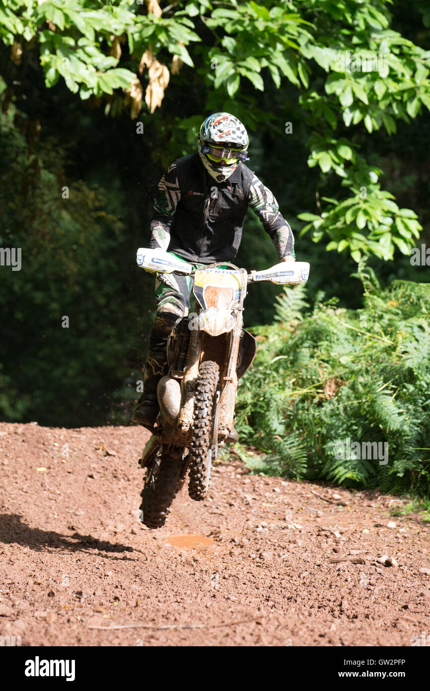 enduro motorcycle rider jumping Stock Photo - Alamy