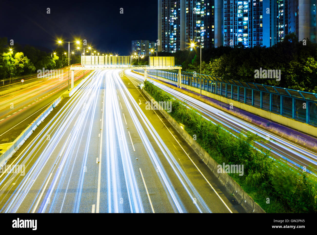 Busy traffic on highway at night Stock Photo - Alamy
