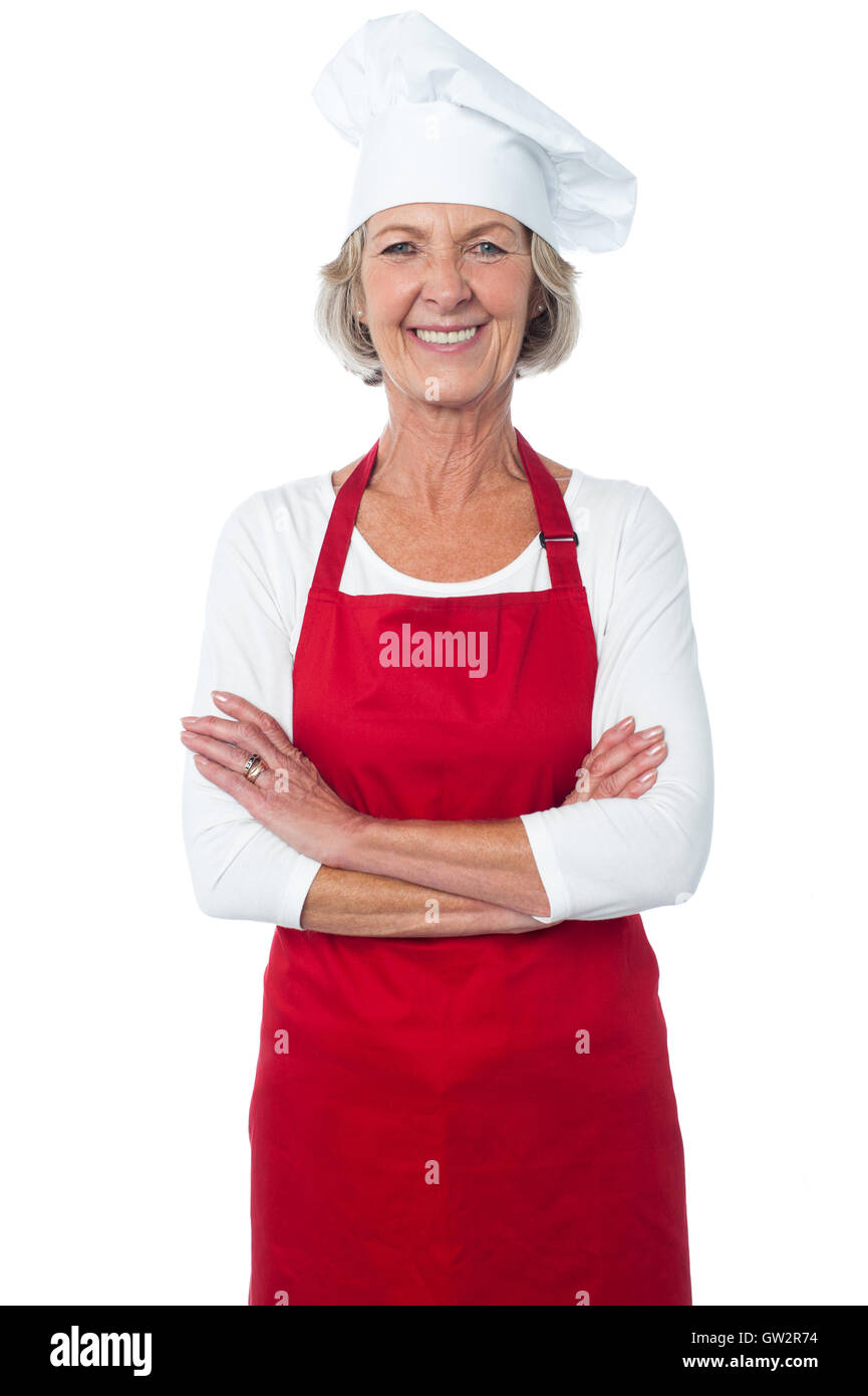 Cheerful confident aged female chef Stock Photo - Alamy