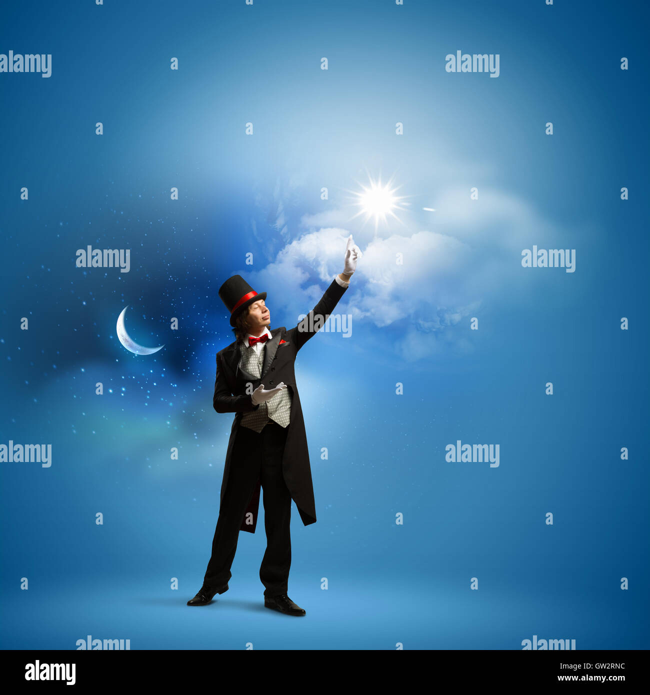Magician in hat Stock Photo - Alamy