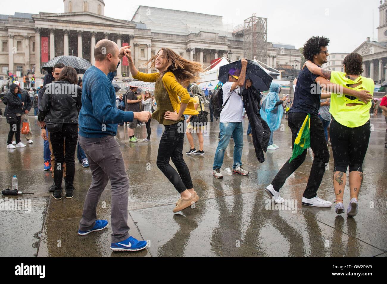 People Dancing In The Rain