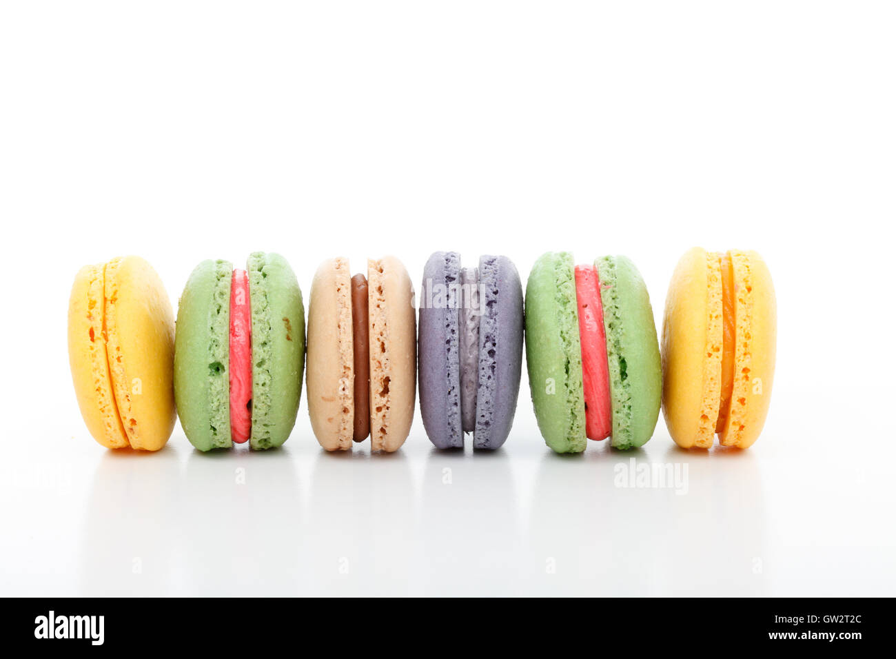 Assorted variety macarons macaroons in a row Stock Photo - Alamy