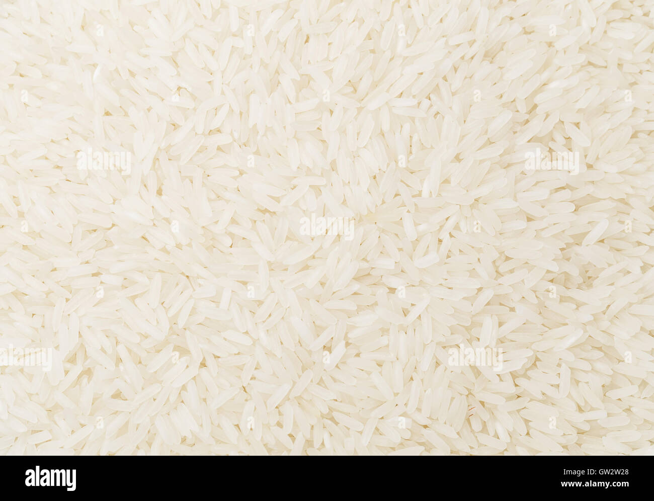 Uncooked white rice Stock Photo - Alamy