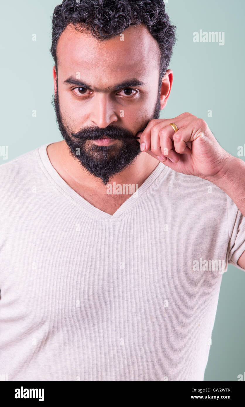 Indian or asian bearded young man or hipster in multiple activities ...
