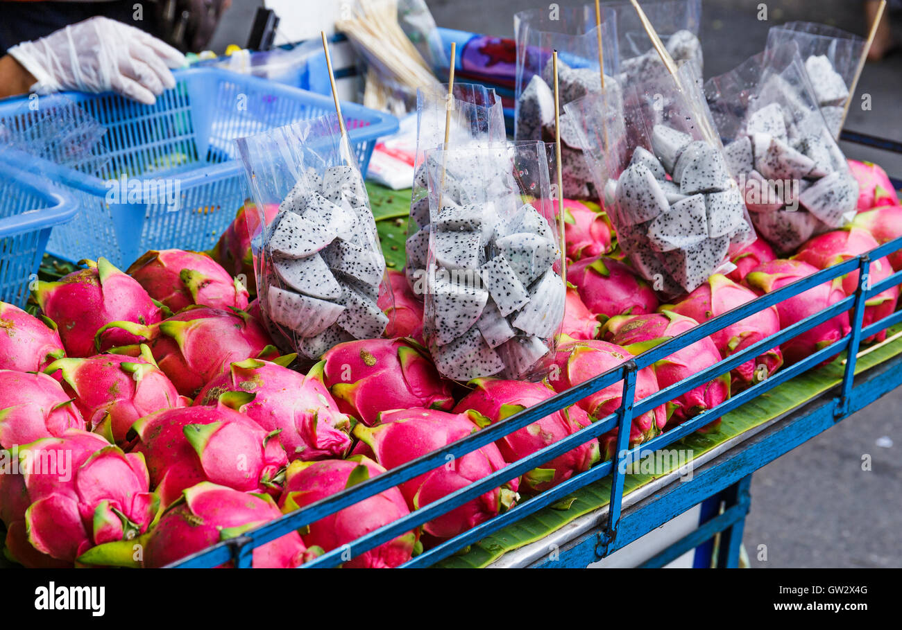 Dragon fruit on market stand in Thailand Stock Photo - Alamy