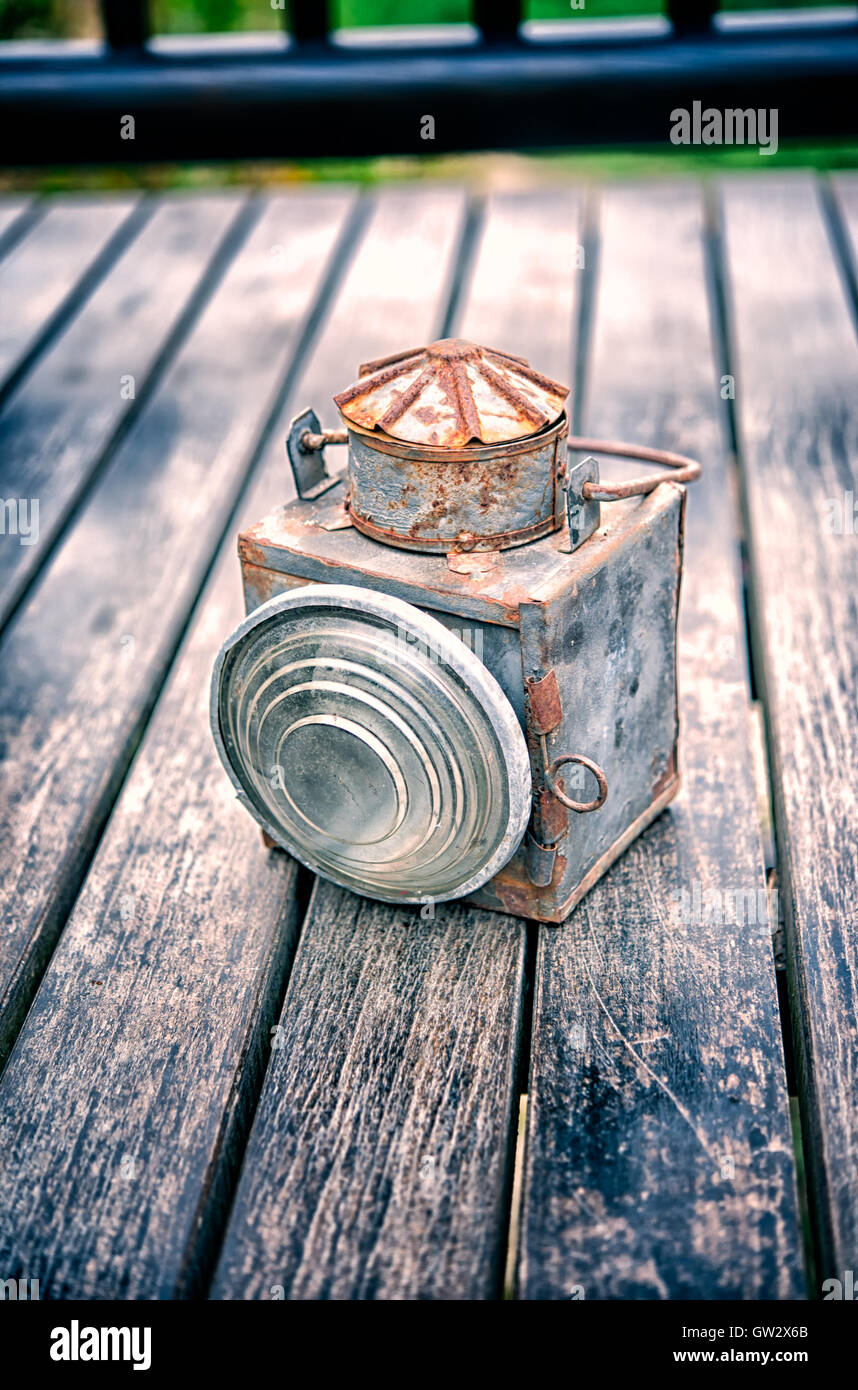 Vintage torch on old wood floor texture Stock Photo - Alamy