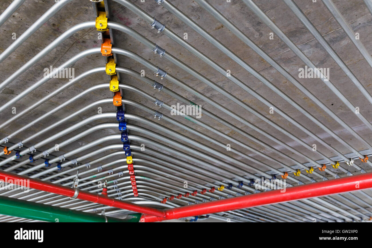 Pipes on ceiling wall Stock Photo - Alamy