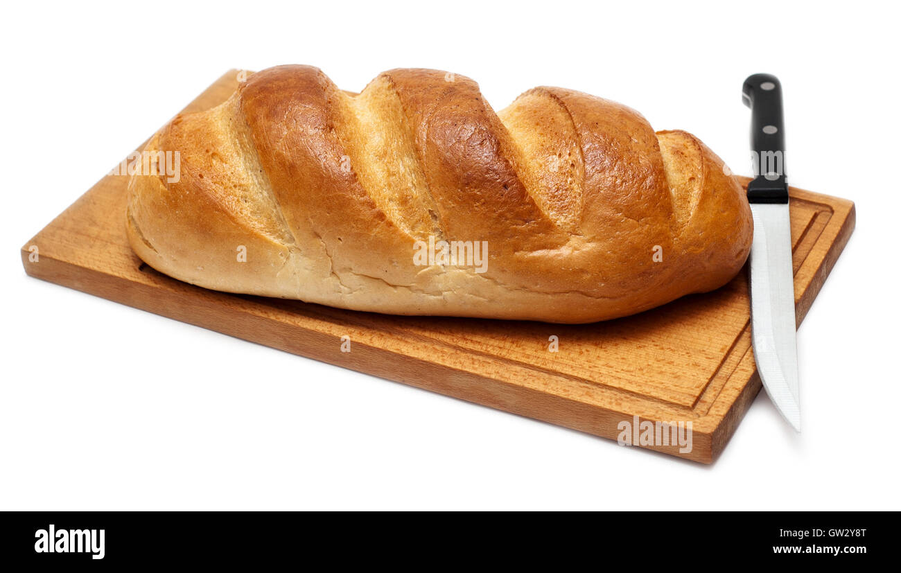 bread with knife on breadboard Stock Photo - Alamy