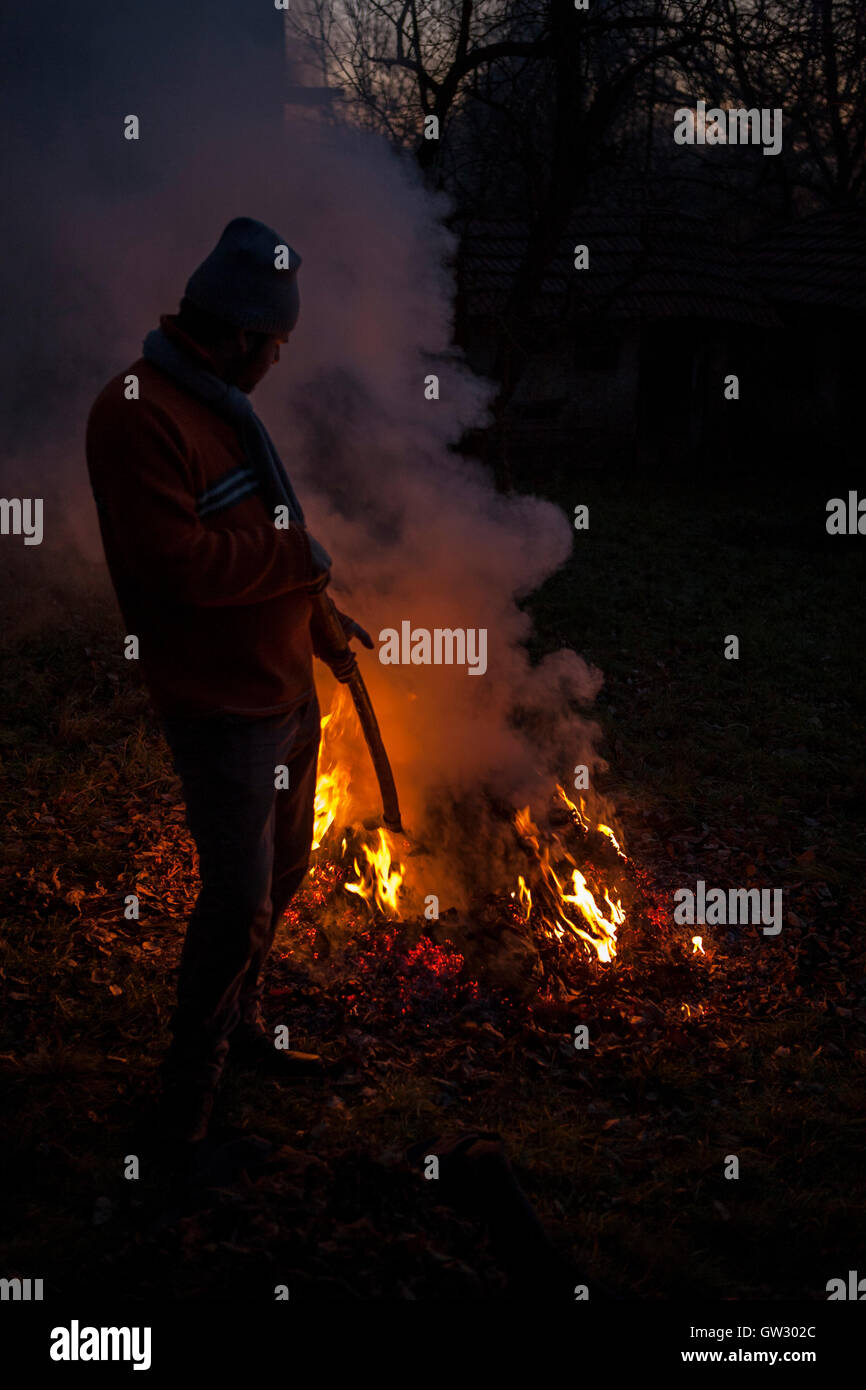 Man burning vegetation hi-res stock photography and images - Alamy