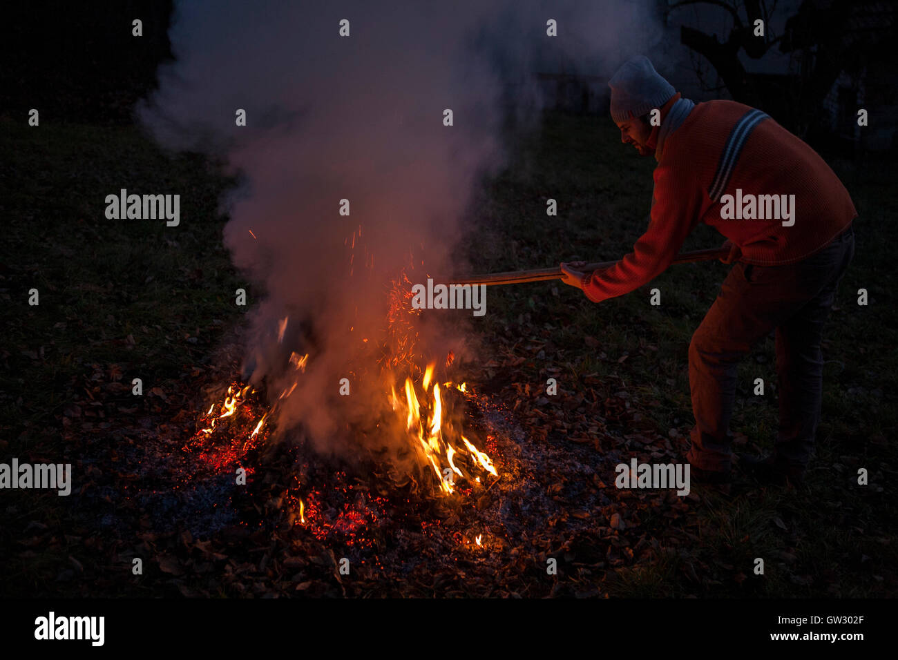 Man burning vegetation hi-res stock photography and images - Alamy