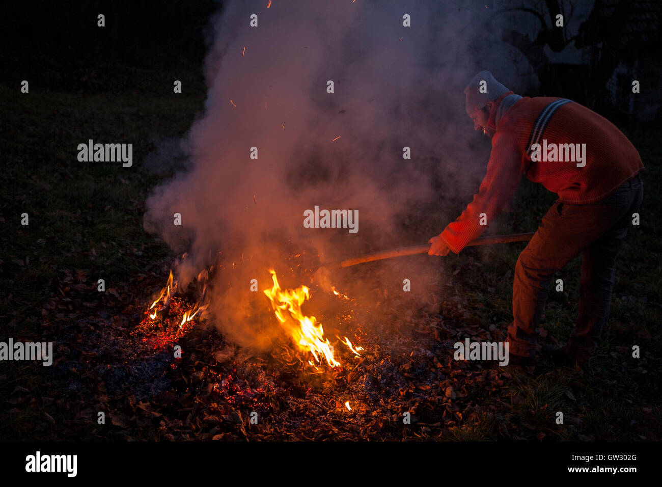 Man burning vegetation hi-res stock photography and images - Alamy