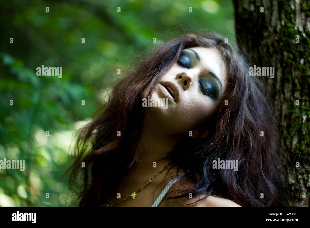 Mysterious portrait of a forest nymph Stock Photo - Alamy