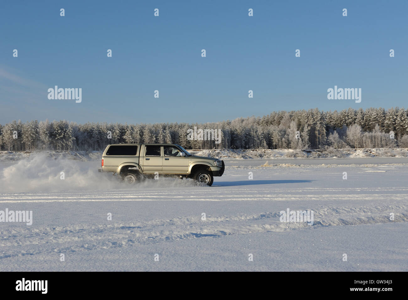 Great Wall Deer pickup driving on snowy river beach Stock Photo - Alamy