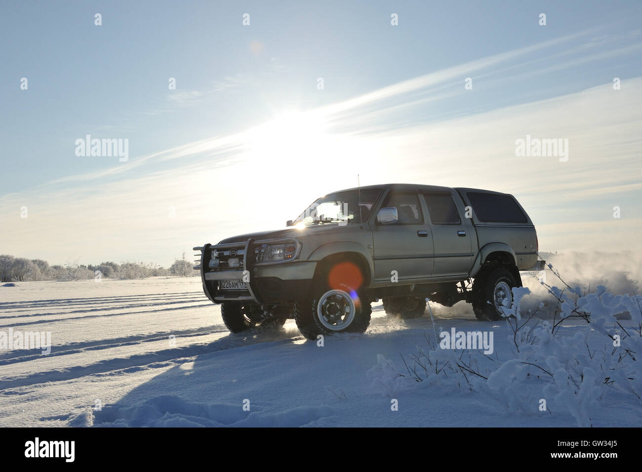 Great Wall Deer pickup driving on snowy river beach Stock Photo - Alamy