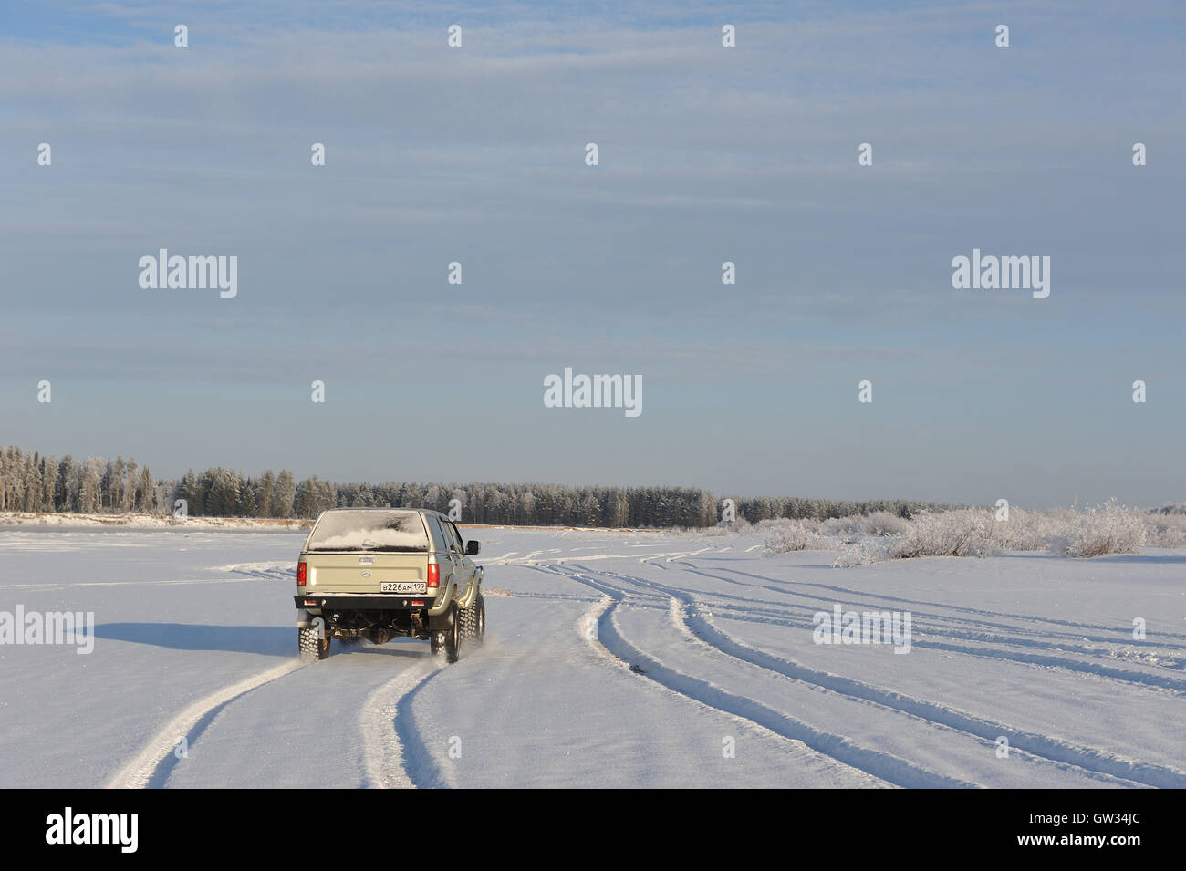Great Wall Deer pickup driving on snowy river beach Stock Photo - Alamy